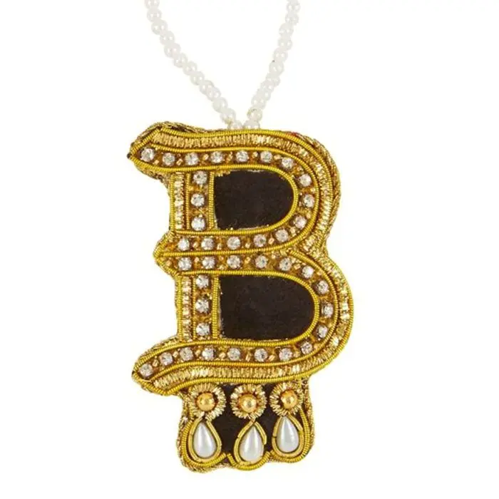 hanging initial decoration